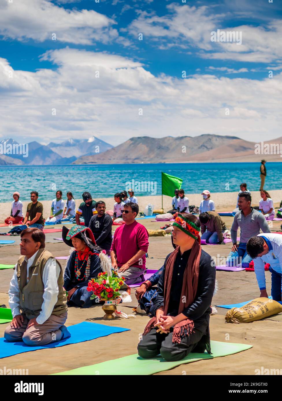 Ladakh, India - June 23,2022: Ladakhi people practicing Yoga at Pangong ...