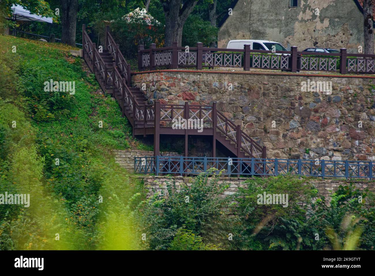 An old rural area with descending stairs from a parking lot Stock Photo ...