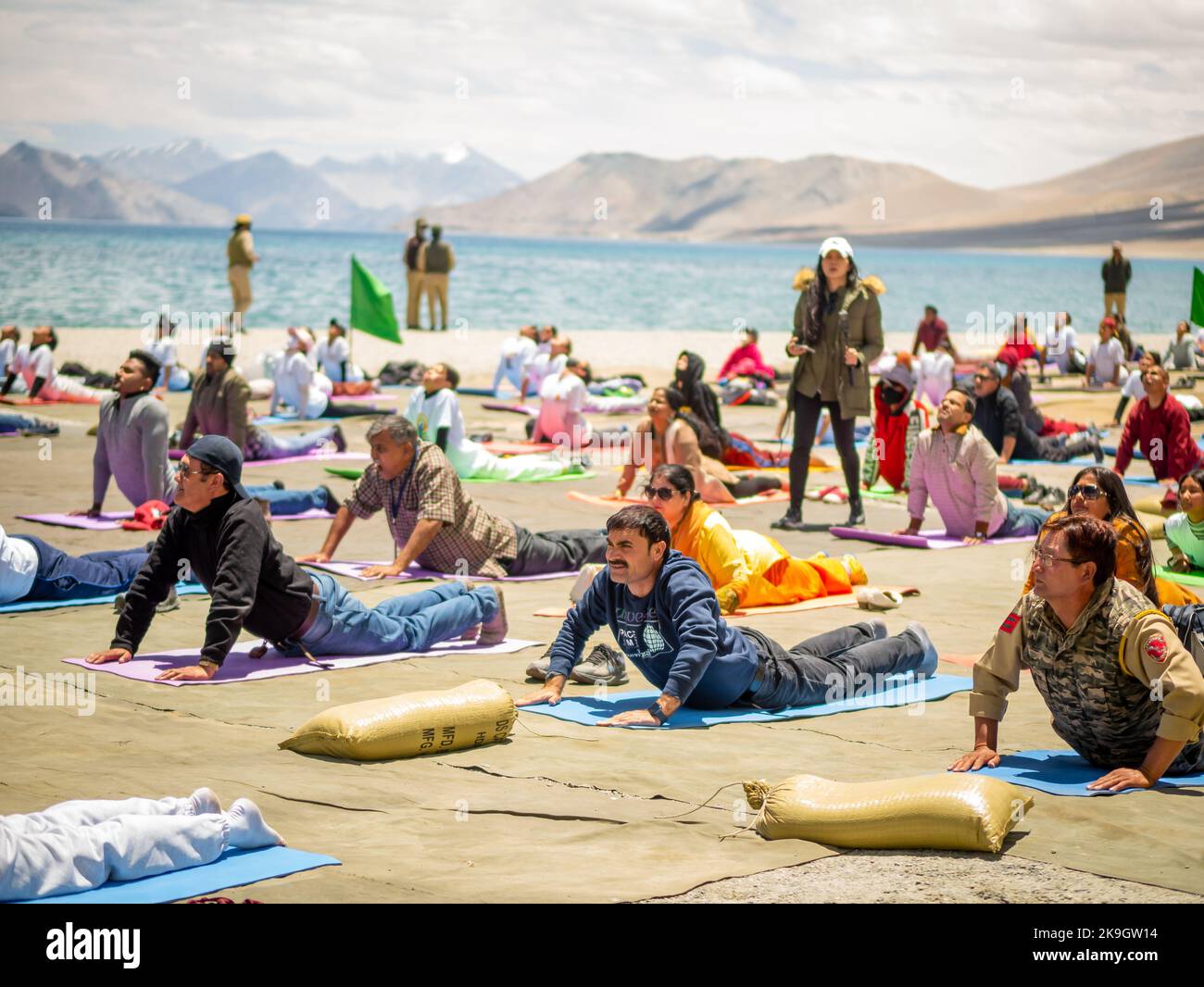 Ladakh, India - June 23,2022: Ladakhi people practicing Yoga at Pangong ...
