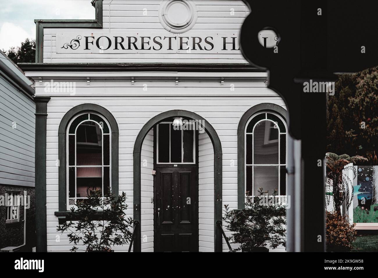 nice wooden entrance of forresters hall with round windows in quiet ...