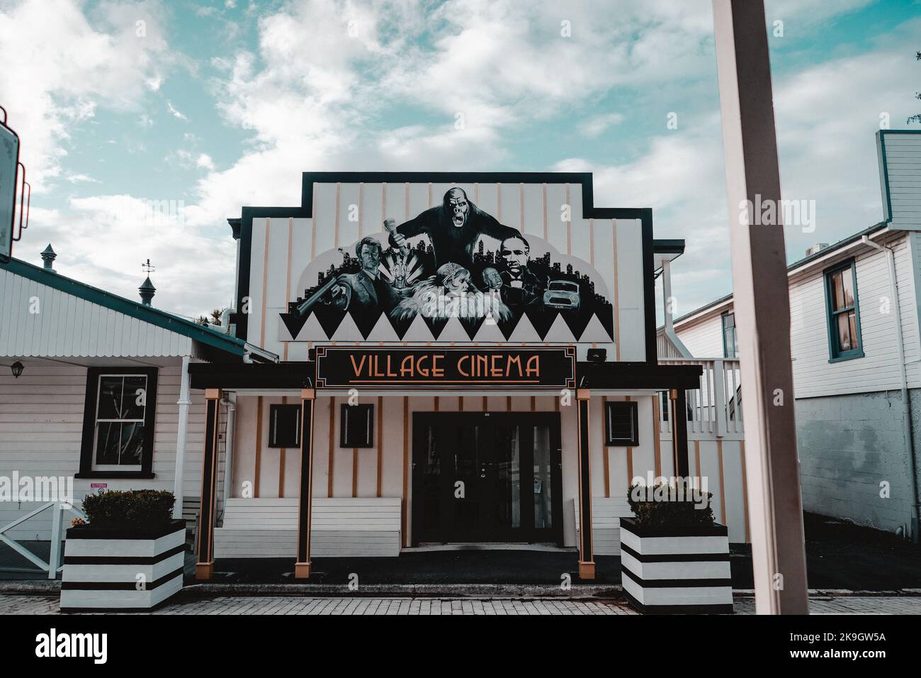 facade of the old village cinema with the images of the protagonists of ...