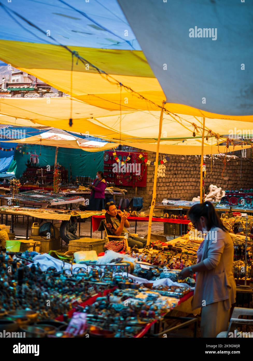 Ladakh, India - June 18,2022:Tibetan shop vendor at Leh Market, ancient ...
