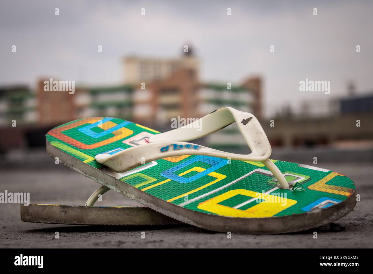 broken dirty poor sandal Stock Photo - Alamy