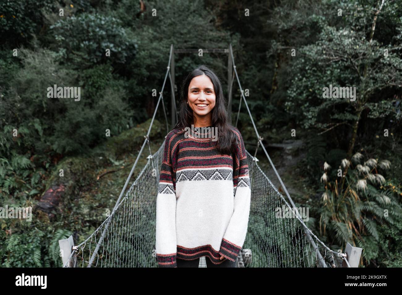 calm and relaxed brunette caucasian young woman smiling standing on ...