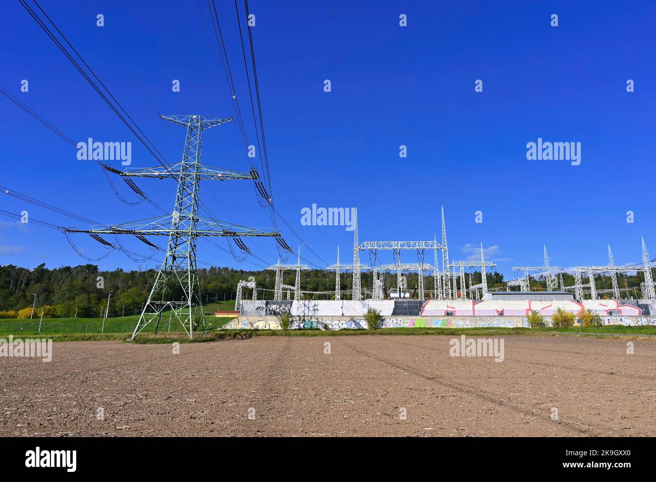 Power plant - electrical energy substation.- High voltage pylons ...