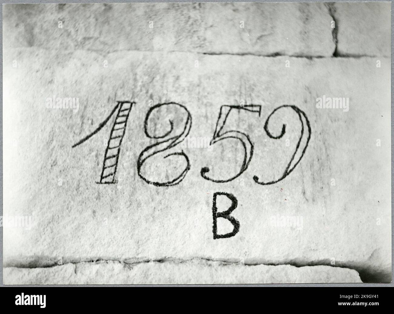 The year 1859 and B carved in viaduct at Tullinge station Stock Photo ...