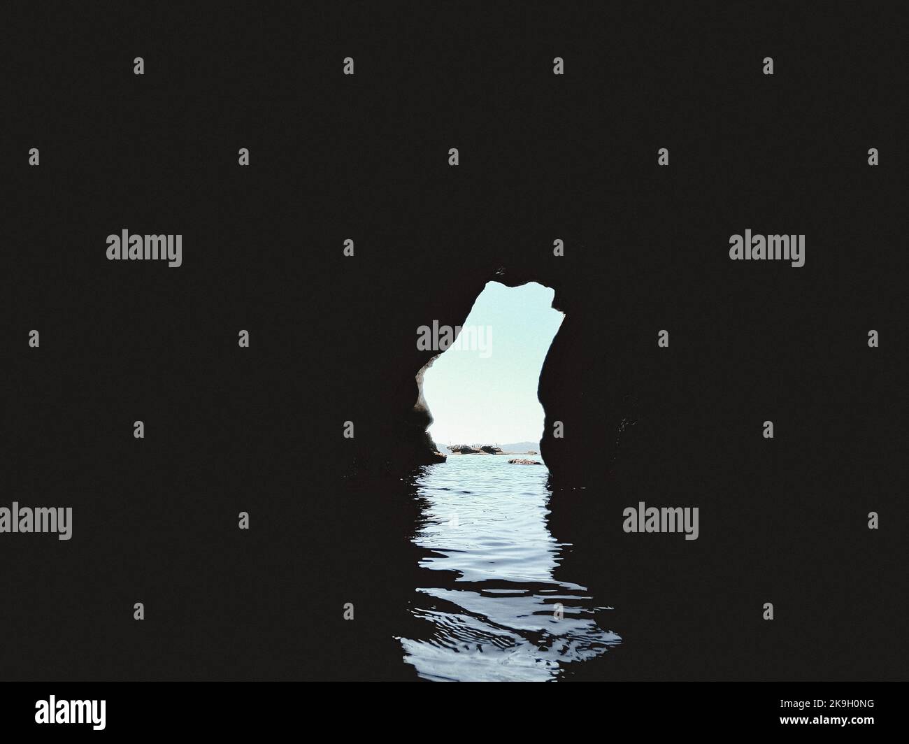 view of the sea from inside a cave Stock Photo - Alamy