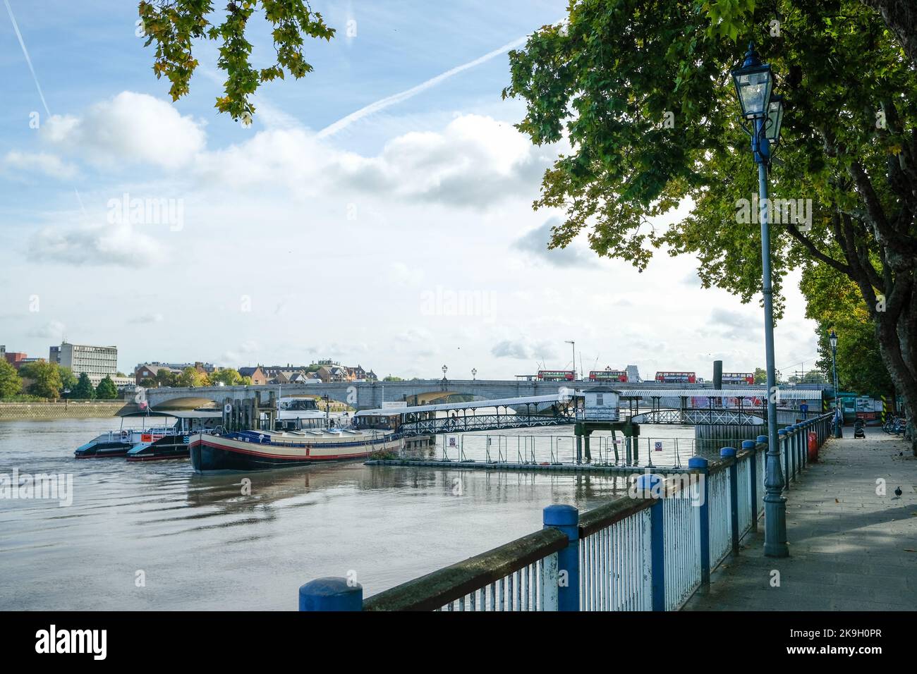 London- October 2022: Putney riverfront by Putney Pier and rowing club ...