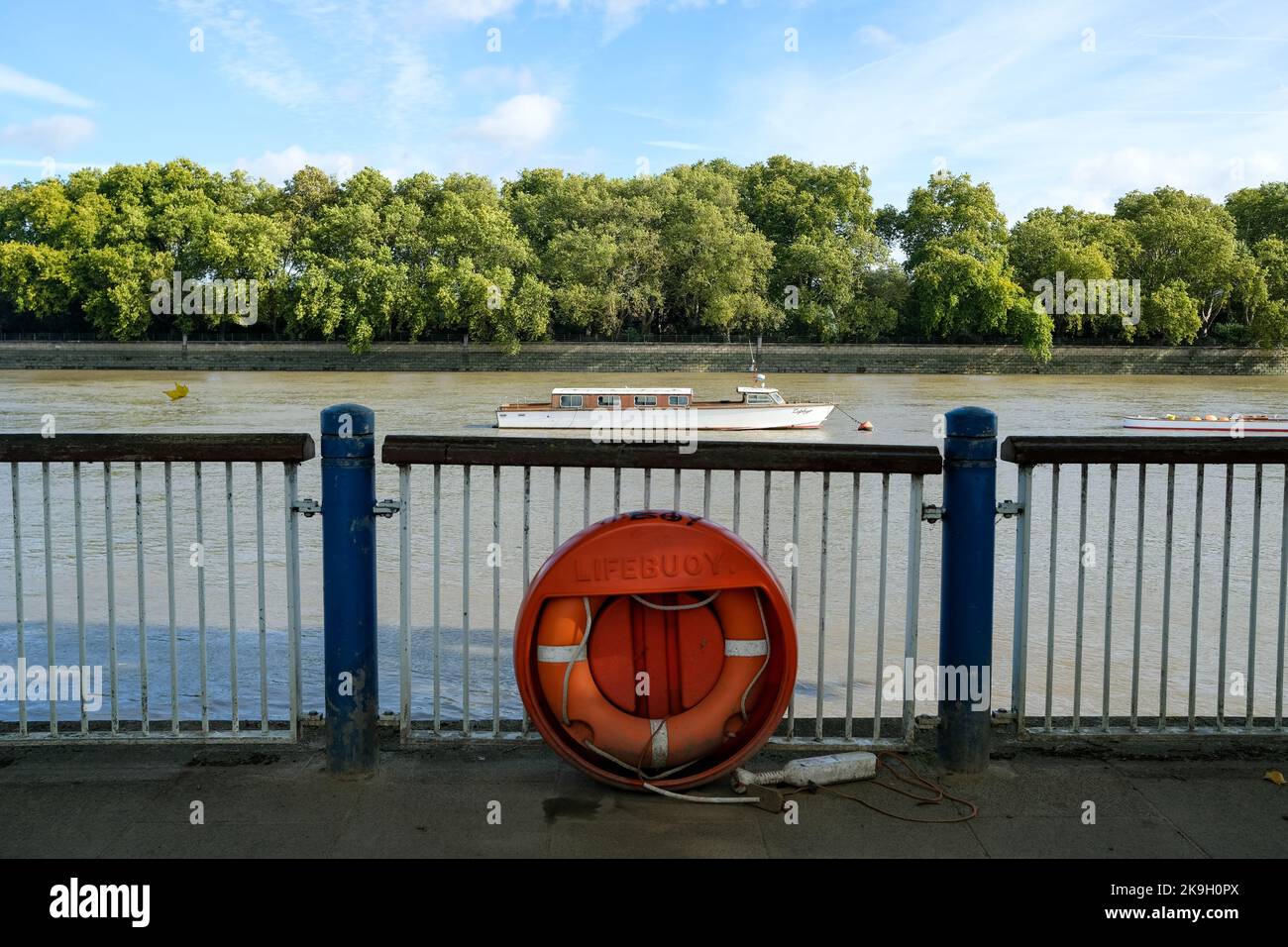 London- October 2022: Putney riverfront by Putney Pier and rowing club ...
