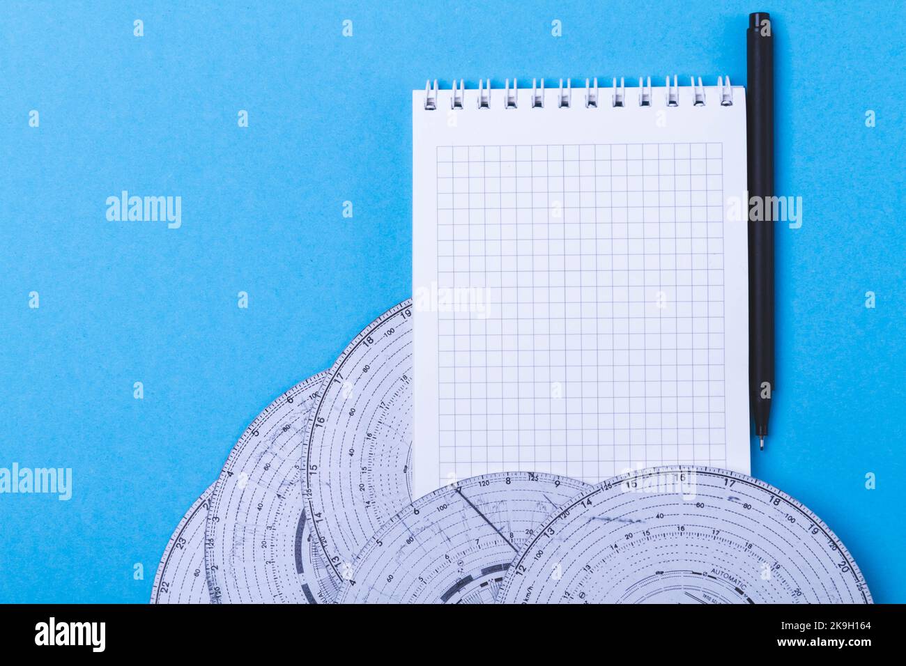 Tachograph and notepad. Driver time tracking. Fixing the movement of ...