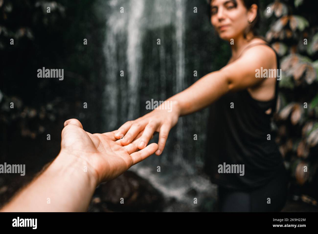 left arm and hand with palm up of a young caucasian man stroking the ...