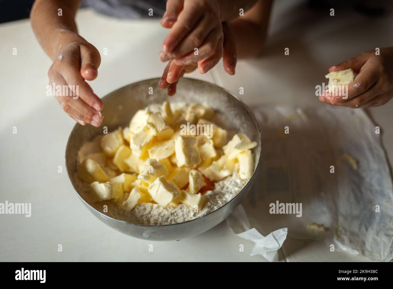 Girls putting hands together hi-res stock photography and images - Alamy