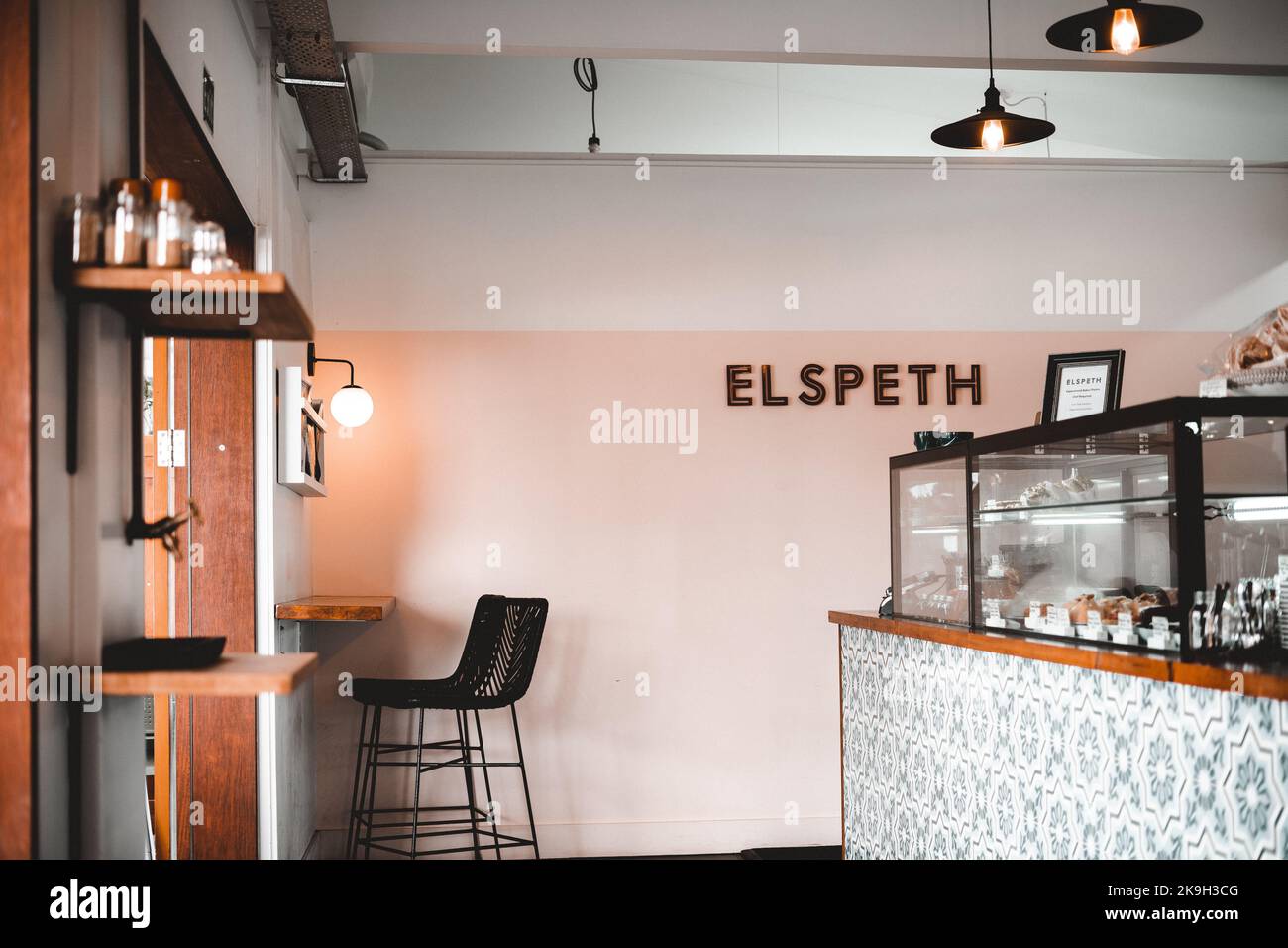 stool and table in modern bar interior Stock Photo - Alamy
