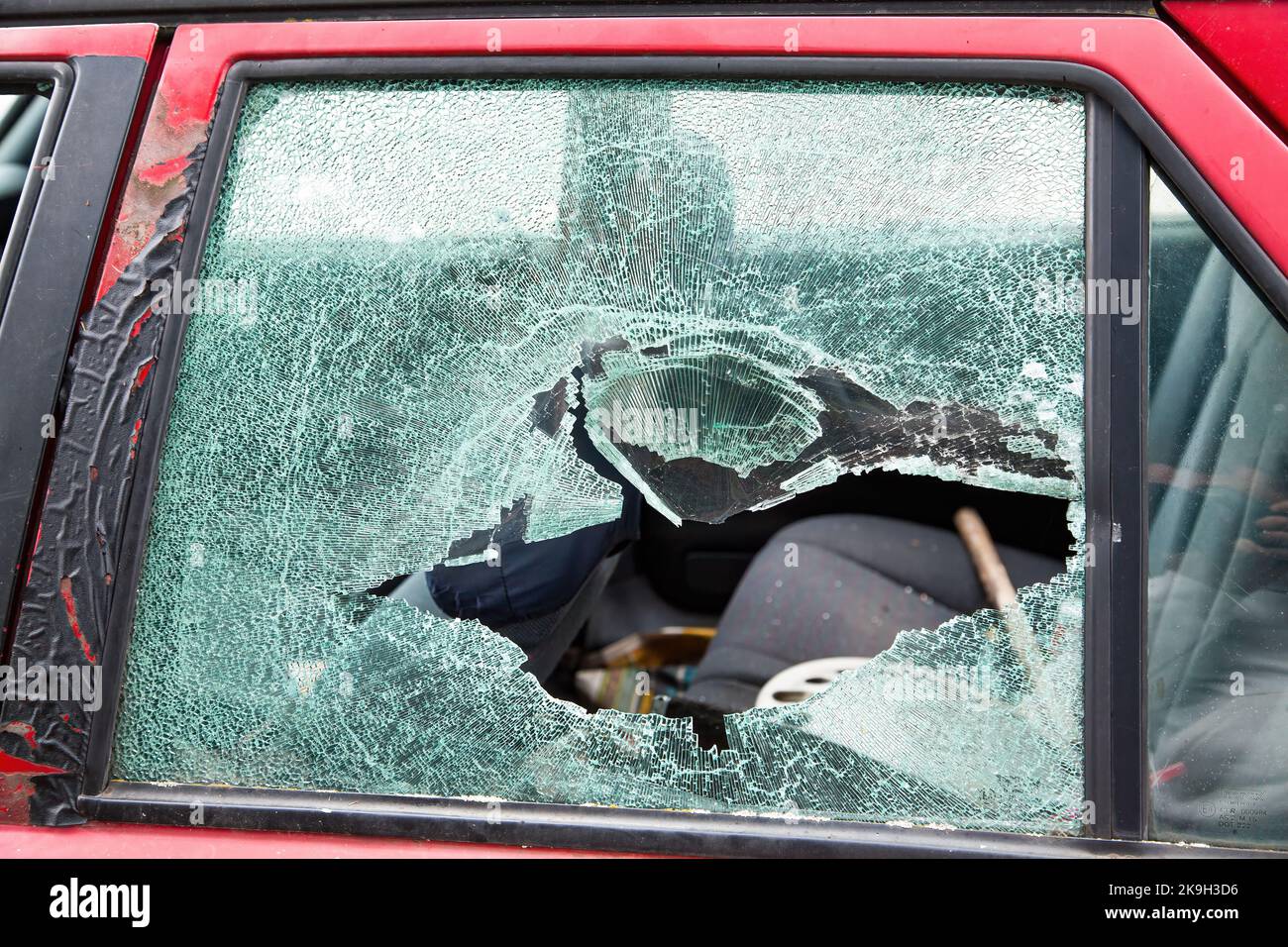 Car with broken windows. A criminal incident. Broken glass window car ...