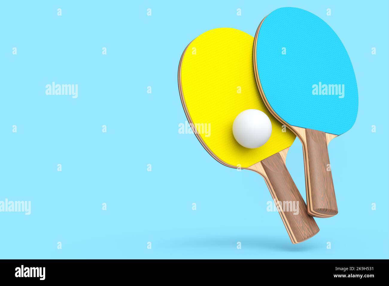 Pair ping pong rackets for table tennis with ball isolated on blue ...