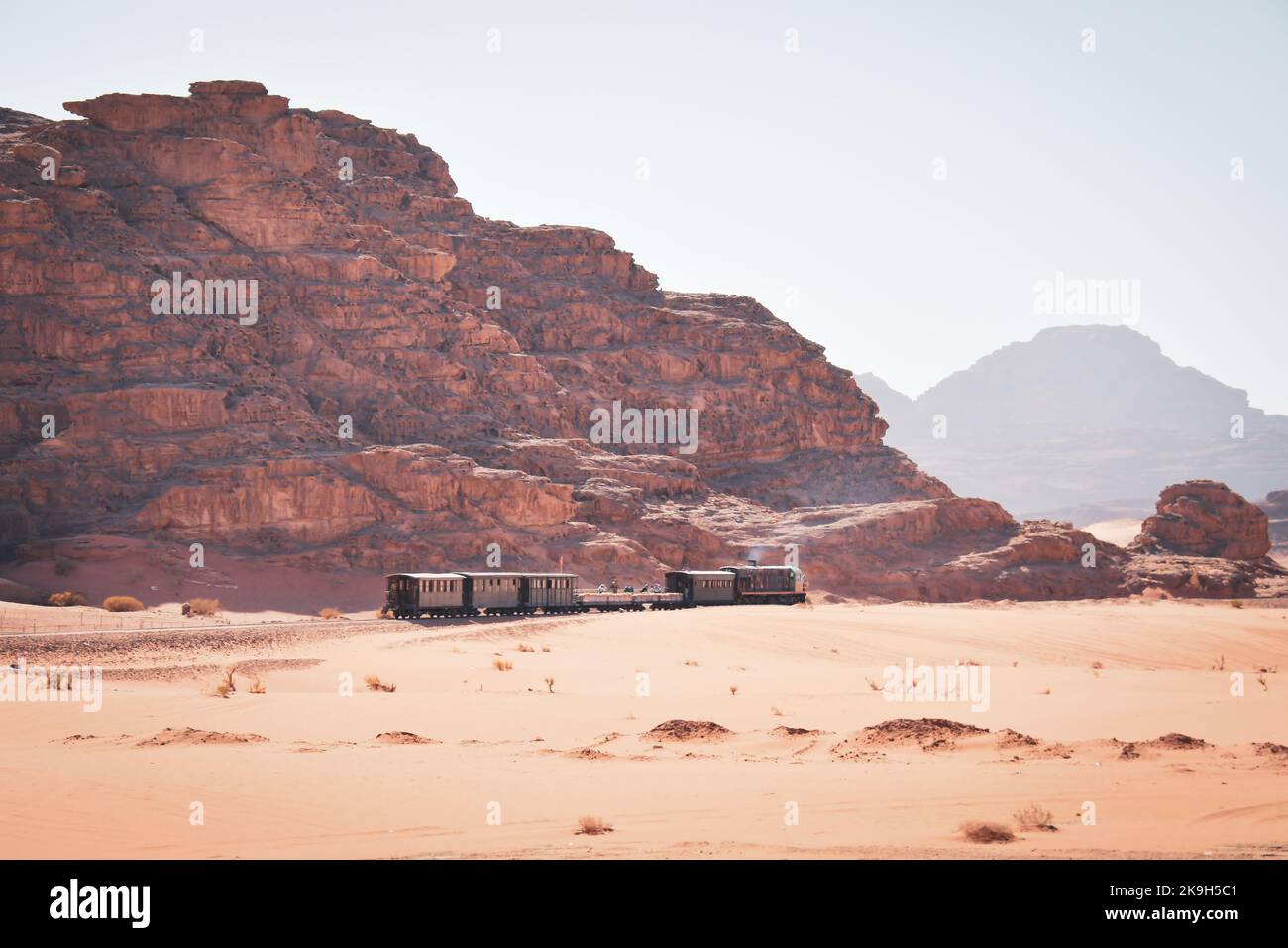 Vintage train in desert. Tourist adventure ride experience Hijaz ...