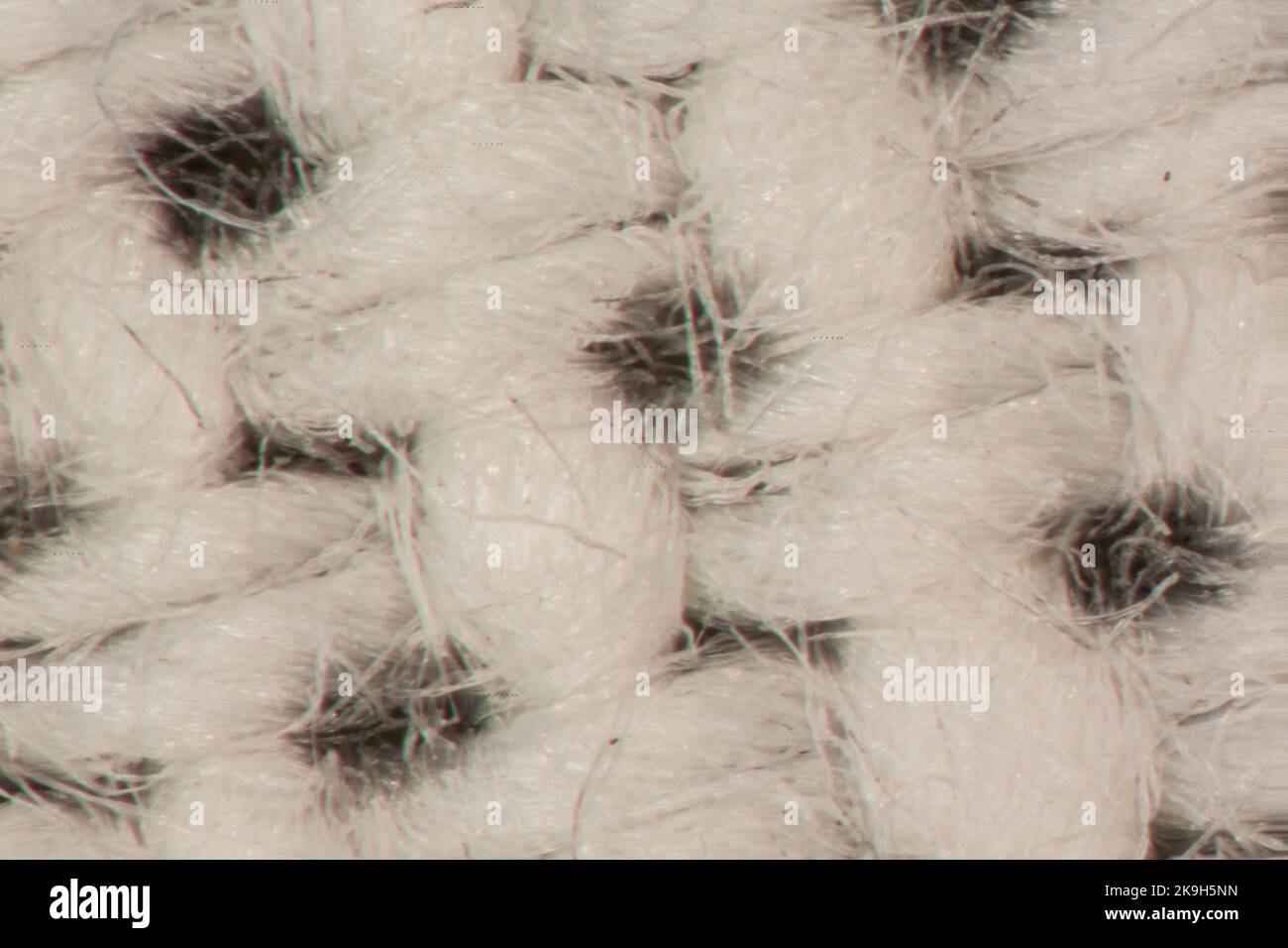 Fibers woven into a colorful fabric Stock Photo - Alamy