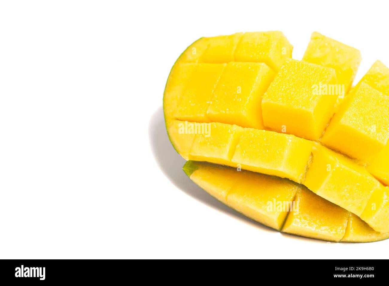 chopped half of ripe mango fruit isolated on white background Stock ...