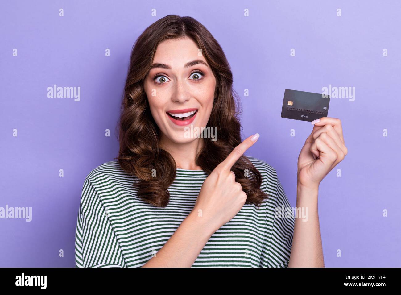 Close up photo of astonished cheerful lady bank client hand hold direct ...