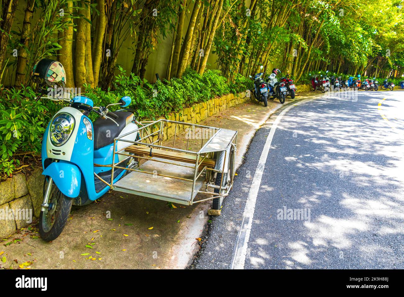 Various motorcycles mopeds and scooters in Naithon Beach Sakhu Thalang ...