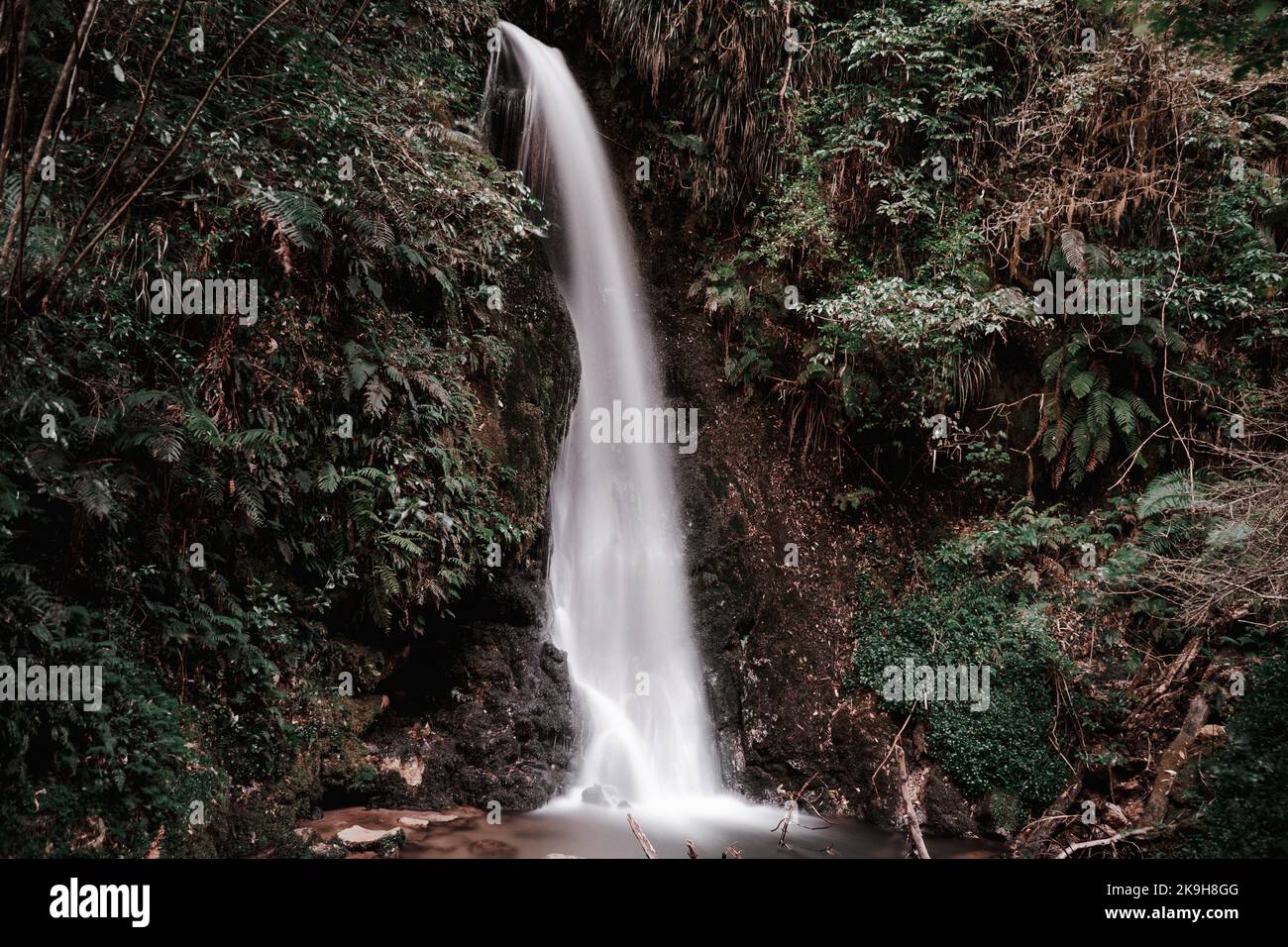 waterfall photographed at slow exposure Stock Photo - Alamy