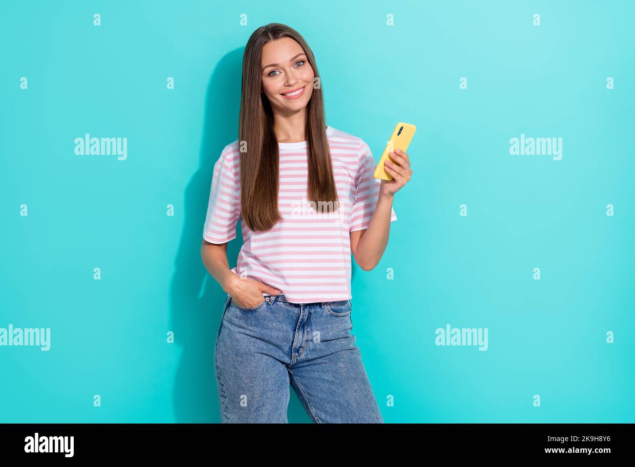 Photo of positive cheerful girl straight hairdo dressed striped t-shirt ...