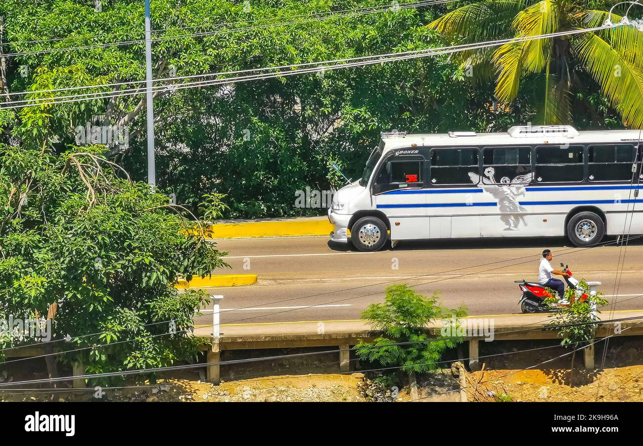 Various colorful buses bus in Puerto Escondido zicatela Oaxaca Mexico ...