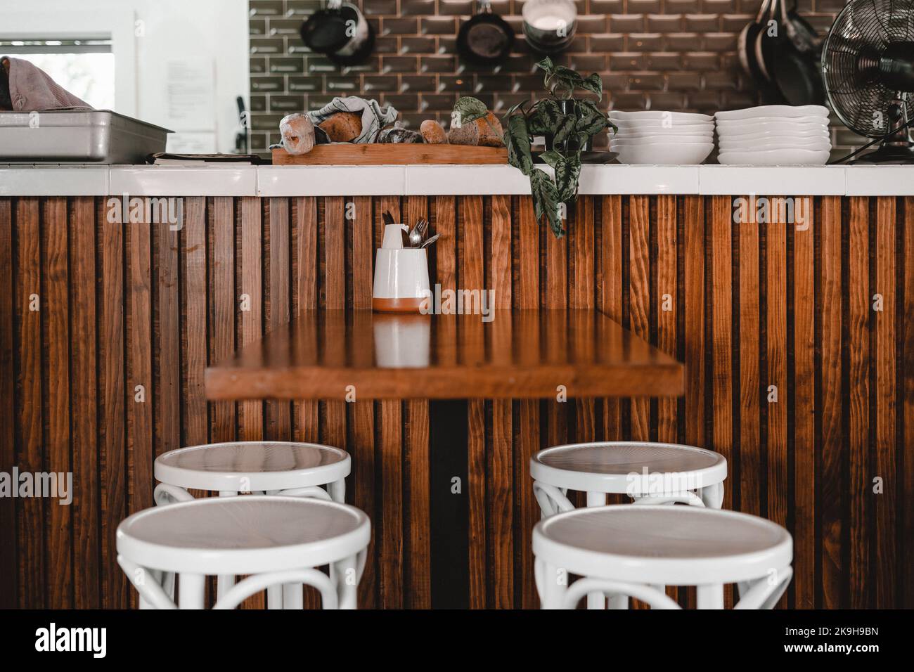 interior of a restaurant and table with stools Stock Photo - Alamy