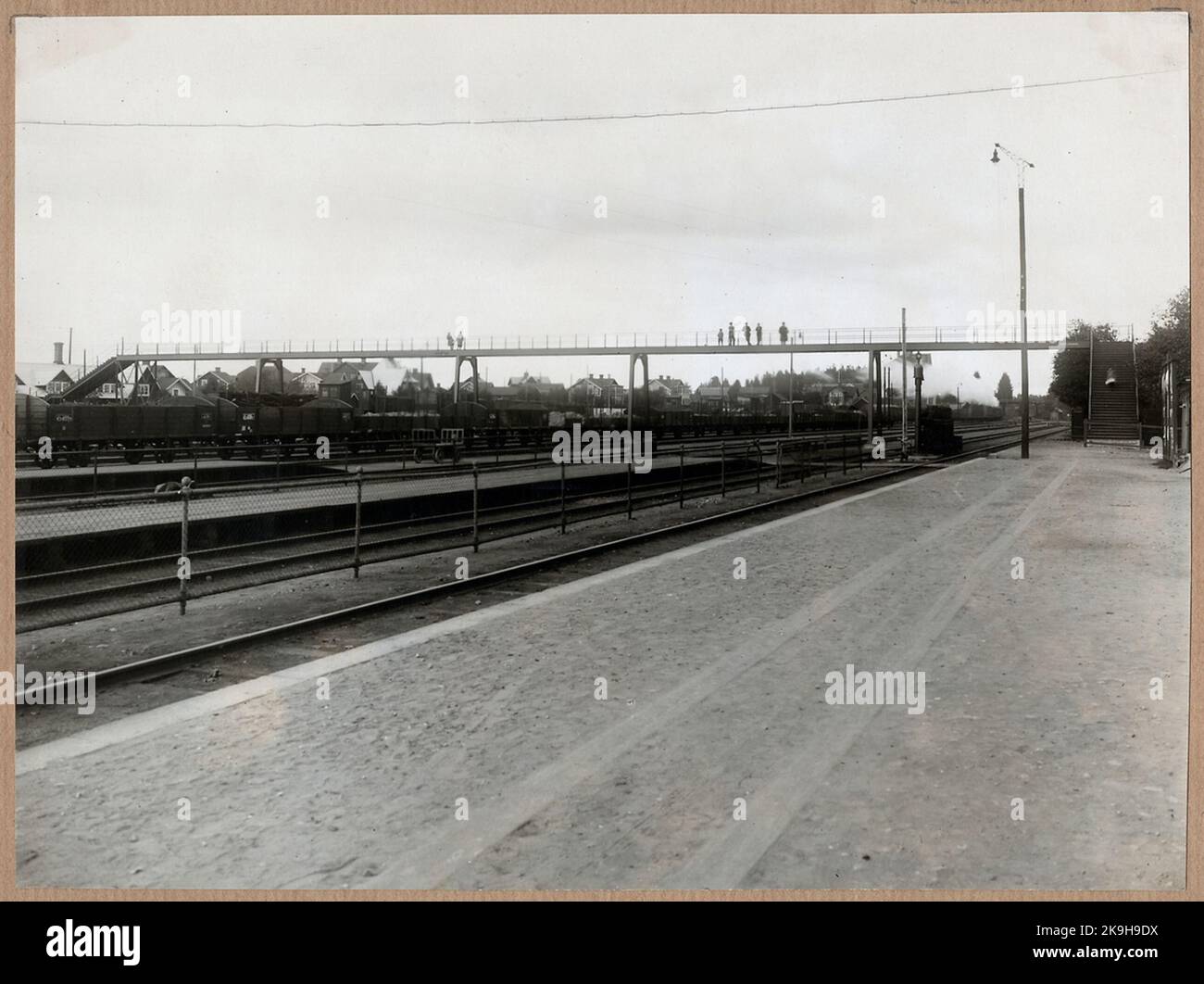 Walking bridge over the yard in Krylbo. State Railways SJ K 16235 and ...