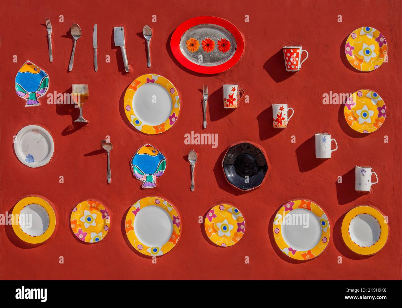 Crockery & cutlery - Plates mugs and spoons Stock Photo - Alamy