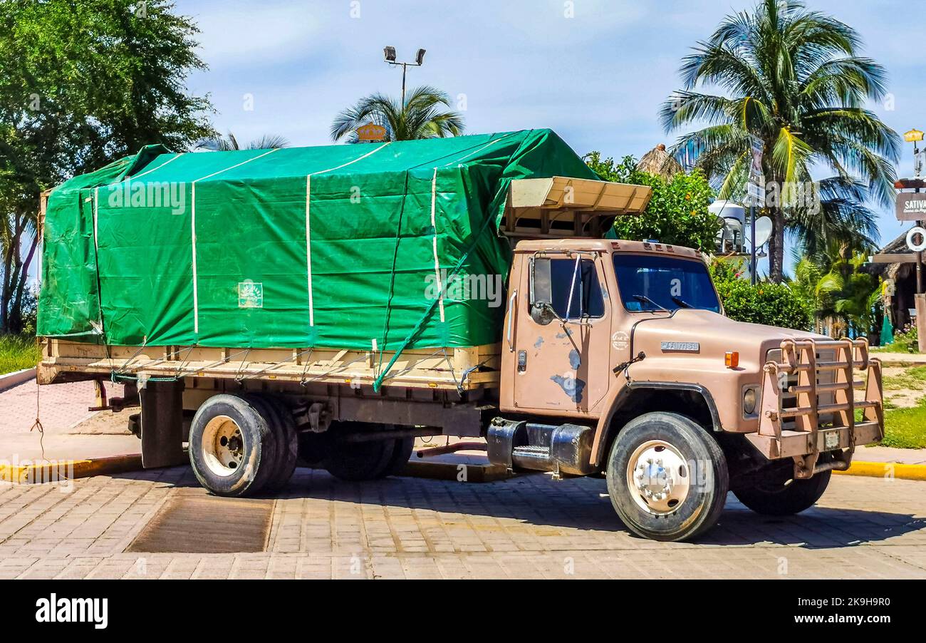 Various Mexican trucks cargo transporter delivery cars in Puerto ...
