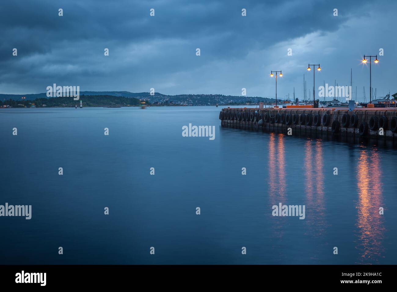 Oslofjord at evening with dramatic sky and pier, Oslo, Norway Stock ...