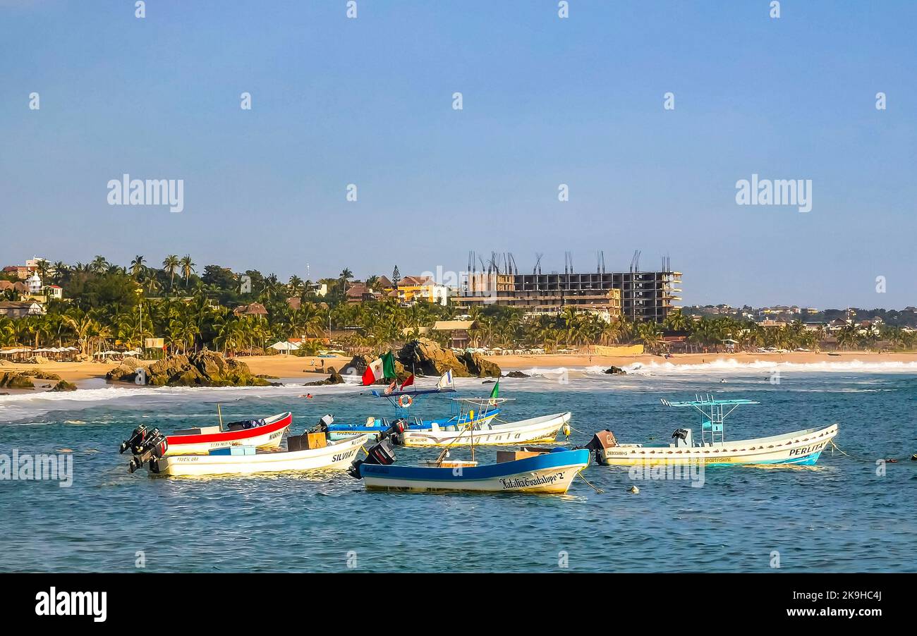 Boat yacht ship pier and harbor at the tropical mexican beach panorama ...