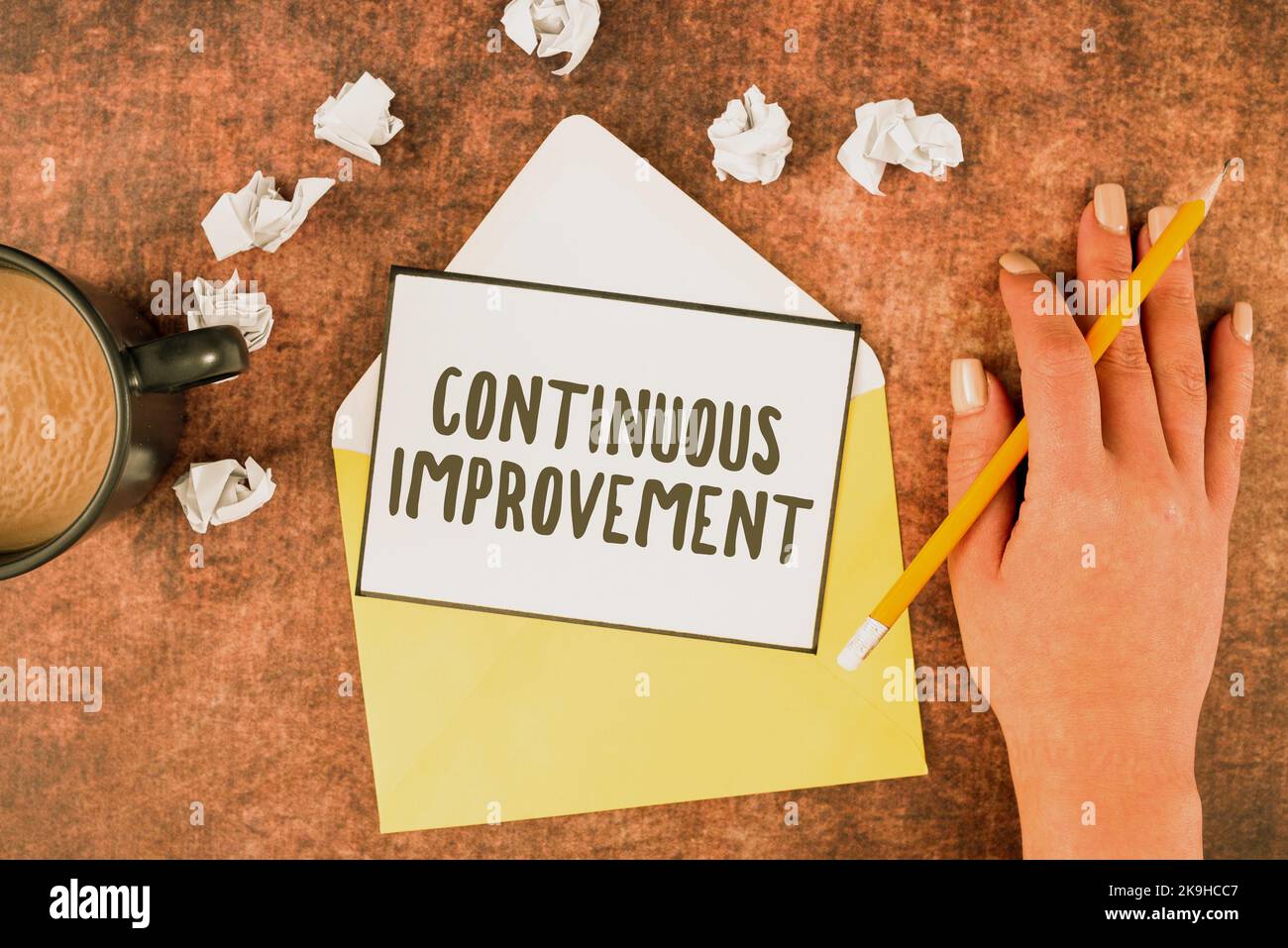 Continuous improvement woman hand hi-res stock photography and images ...