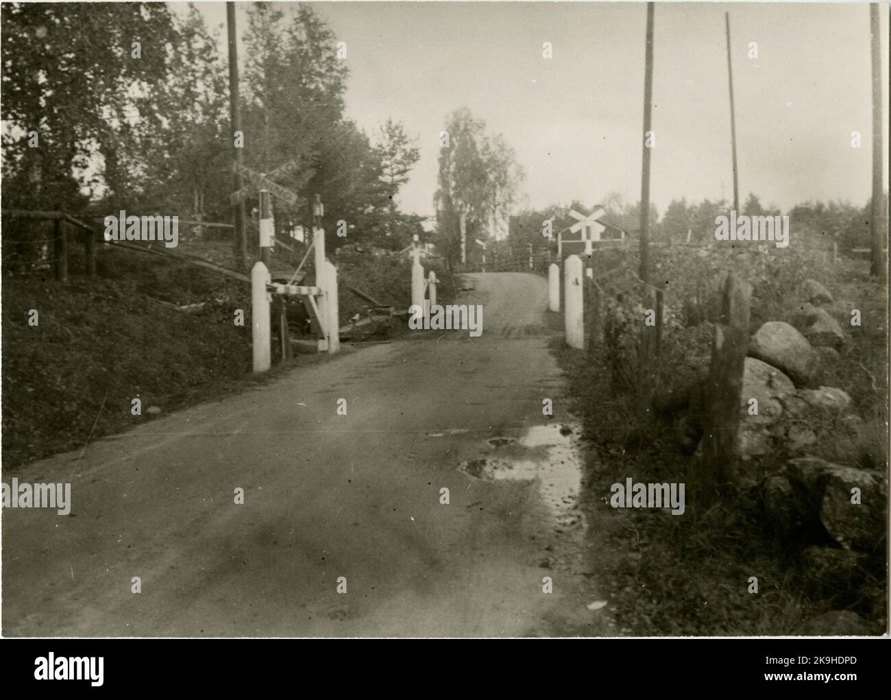 Text on the back of the photo "Road transition at Sunnerstaholm on the ...