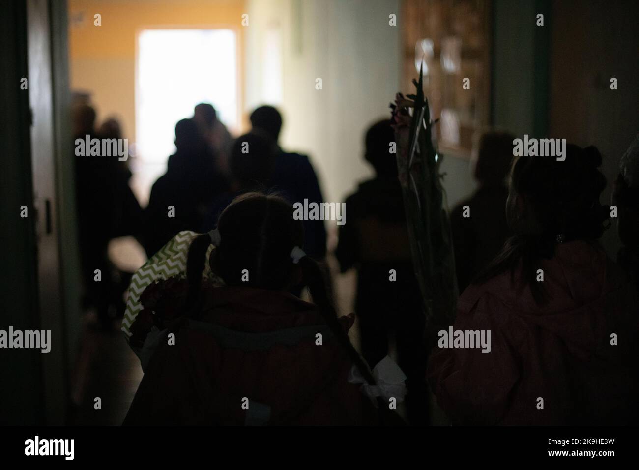Schoolchildren go up stairs. Children in school building. Students go ...