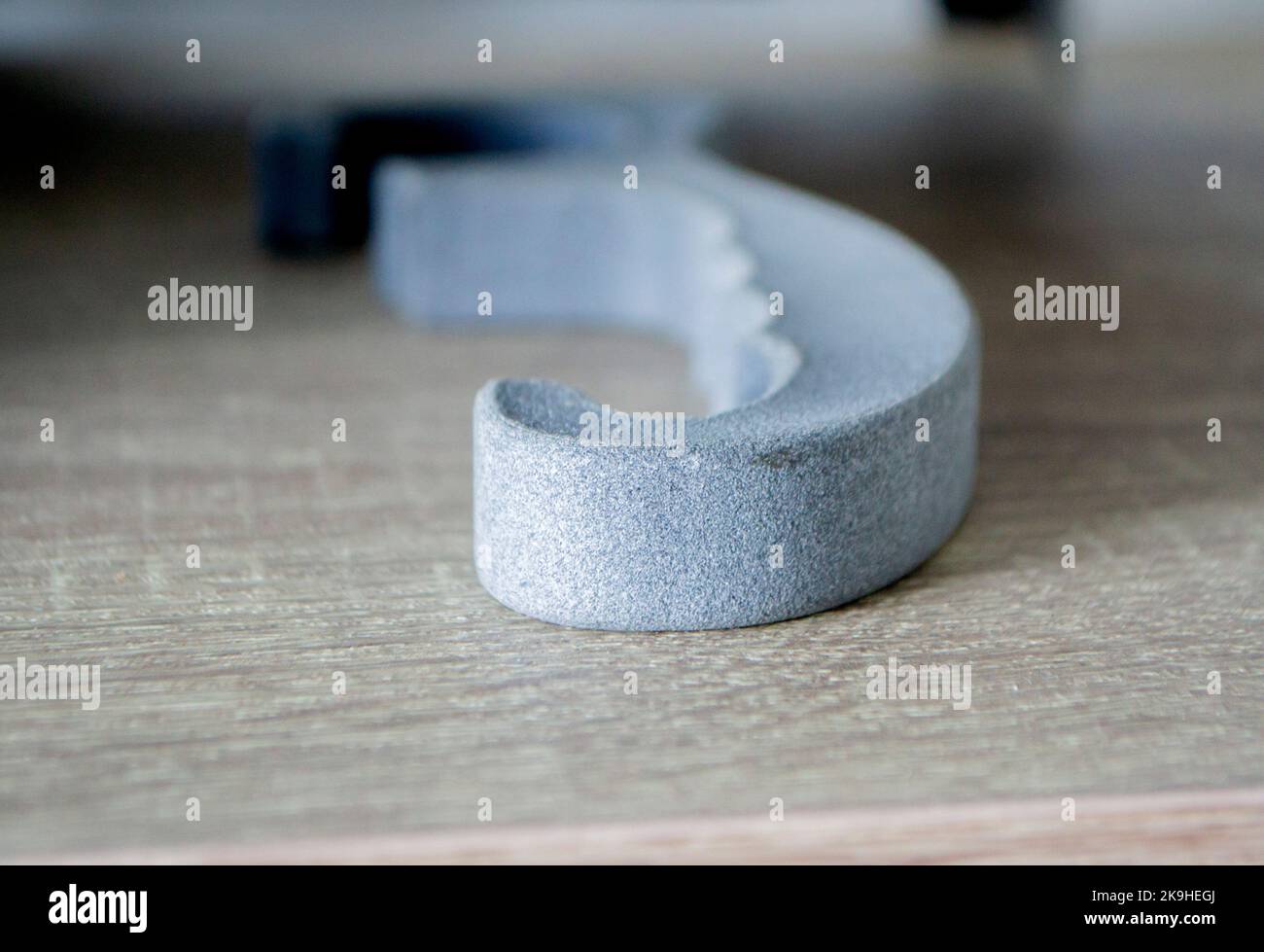 Prototype model printed with powder 3D printer close-up. Abstract black ...