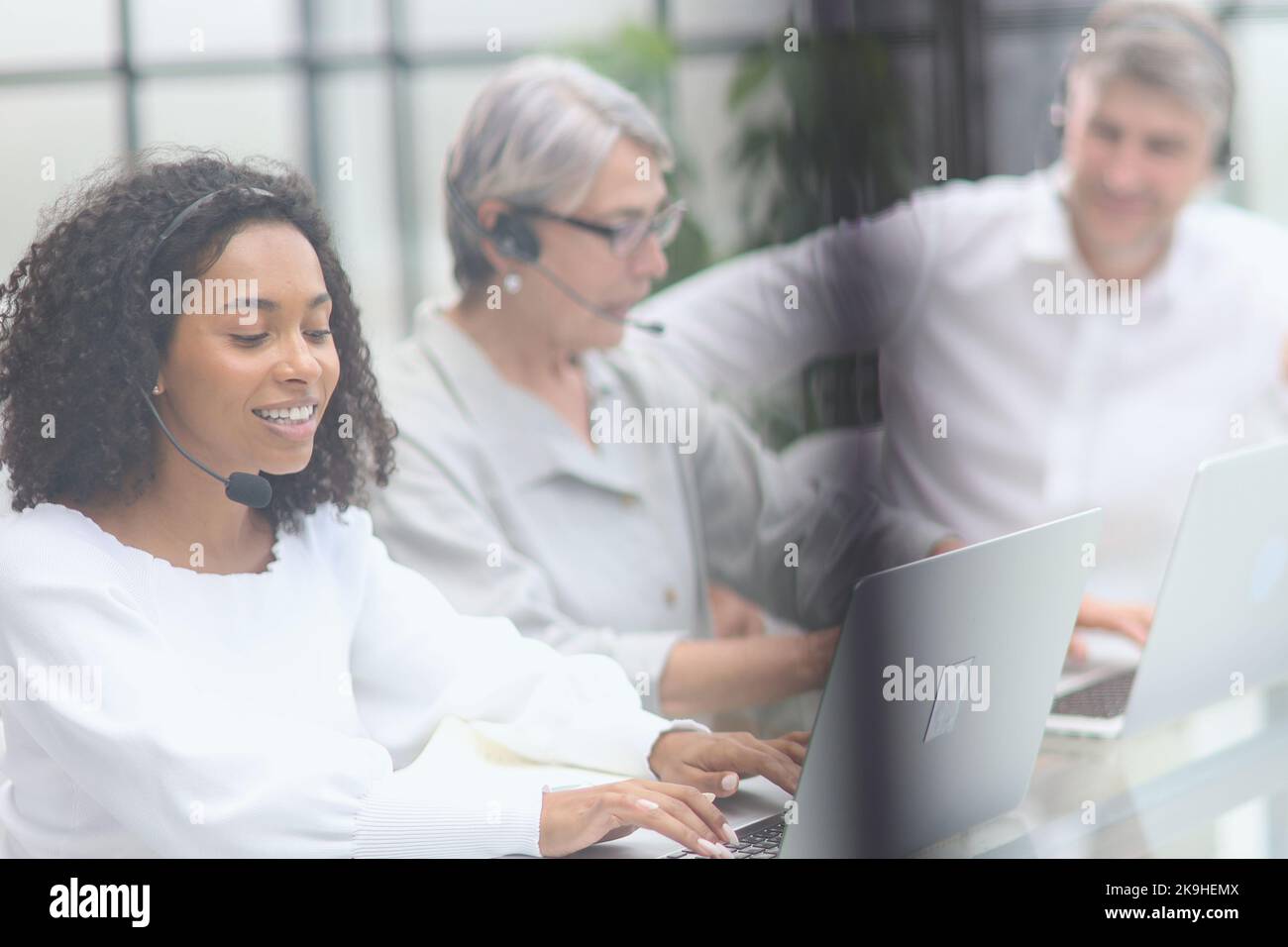 Business group working in customer and help desk office Stock Photo - Alamy