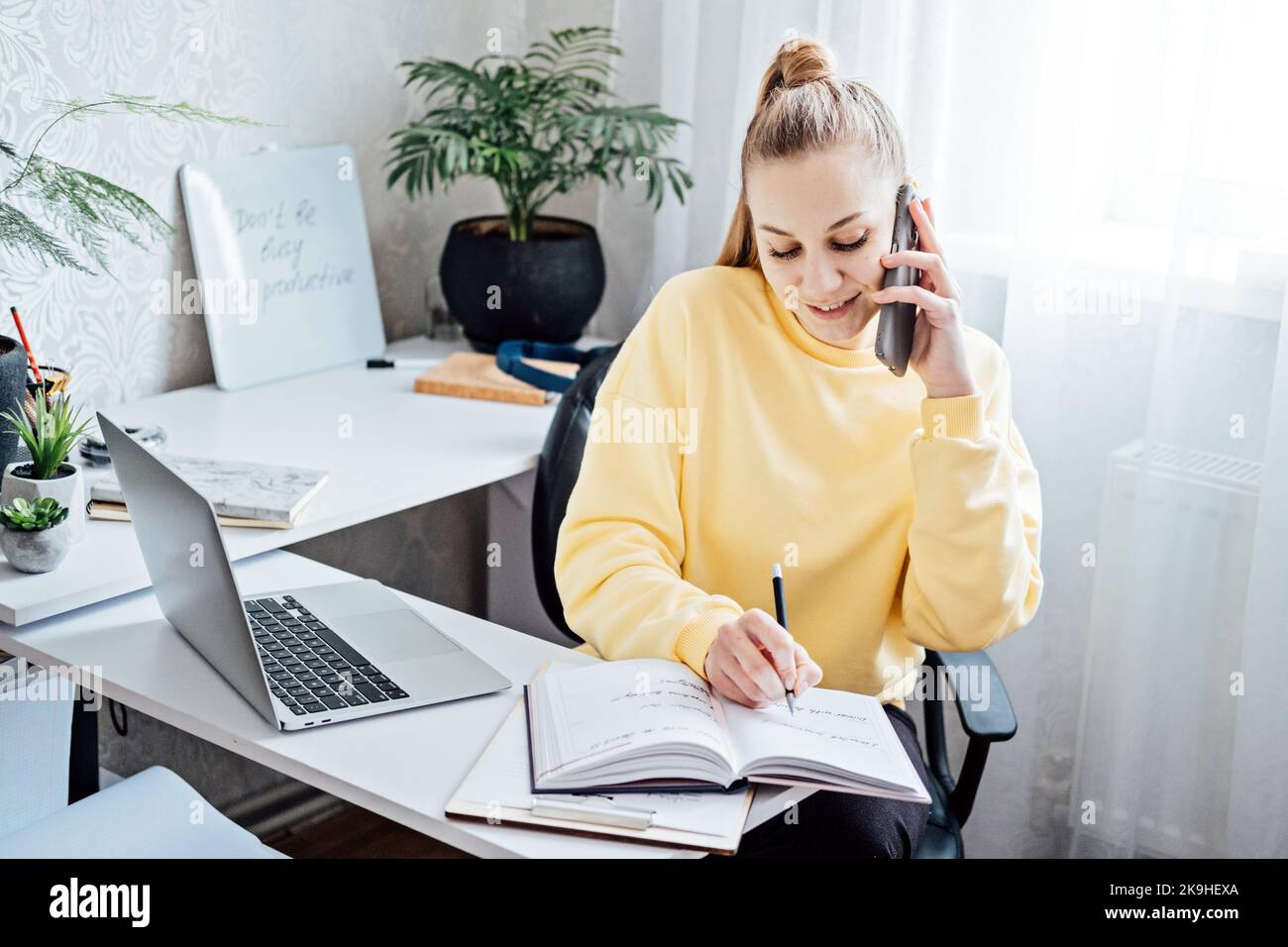 Flexible working, flexible work. Young woman freelancer working at home ...