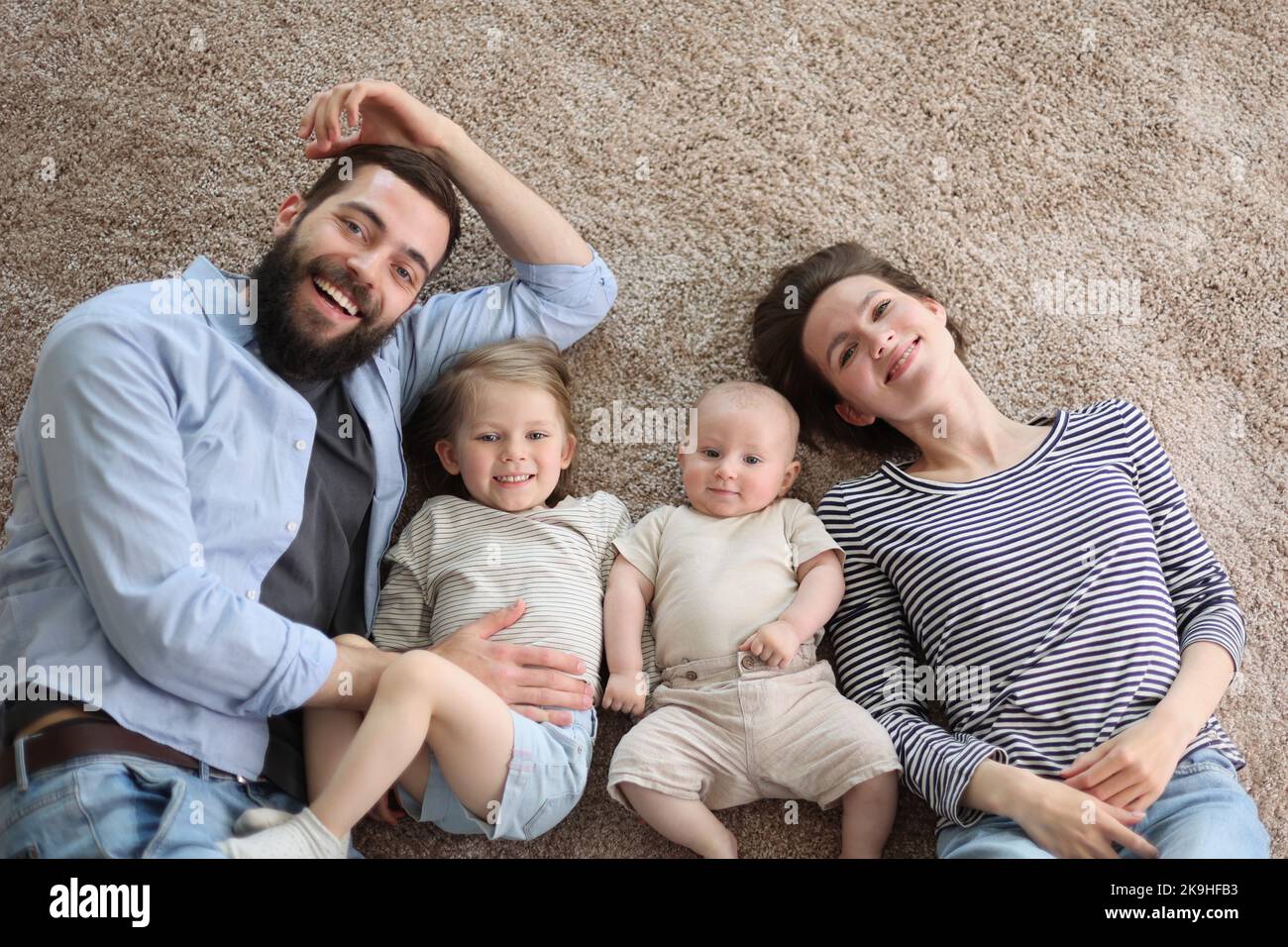 happy family mother father and kids at home Stock Photo - Alamy