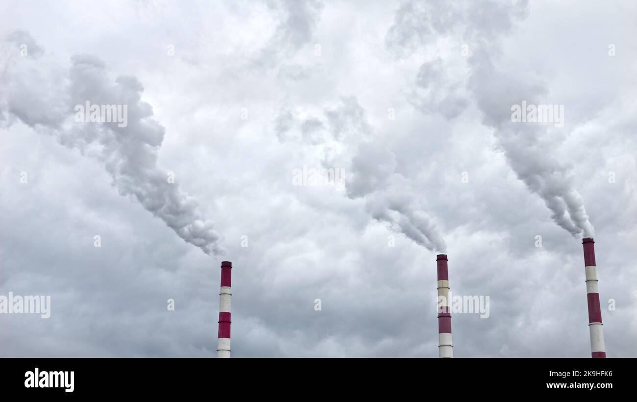 Coal chimneys produce harmful emissions causing pollution Stock Photo ...