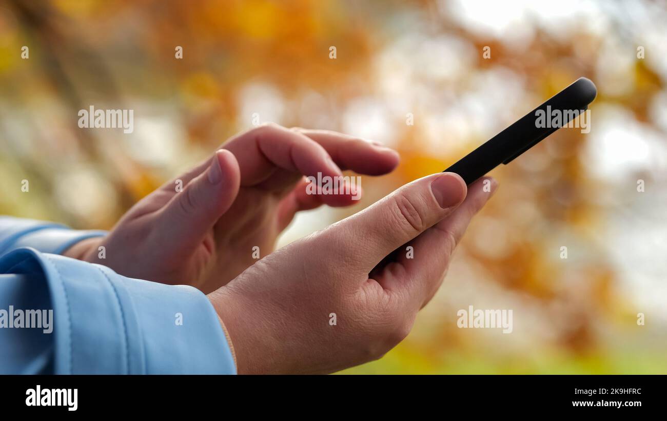 Female hands work on smartphone touching and swiping screen Stock Photo ...