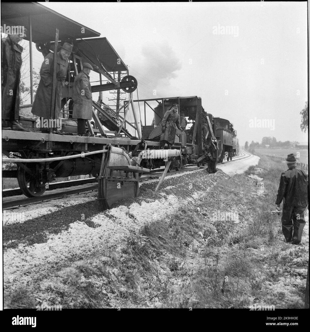 Cable output train. Plusing telecommunications in the embankment before ...