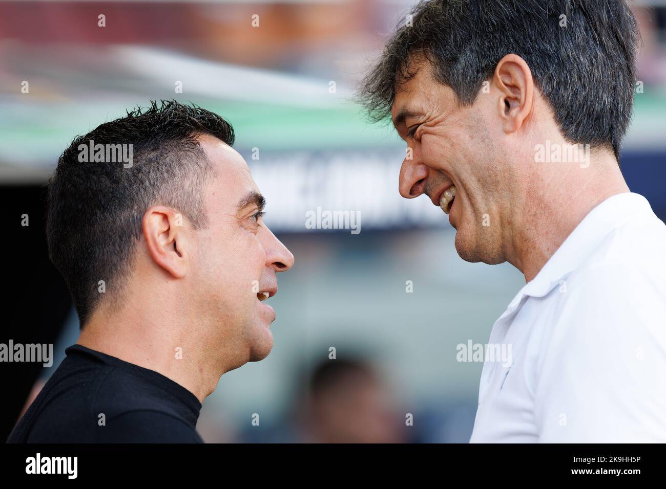BARCELONA - AUG 28: Xavi (L) and Chechu Rojo (R) salute prior to the ...