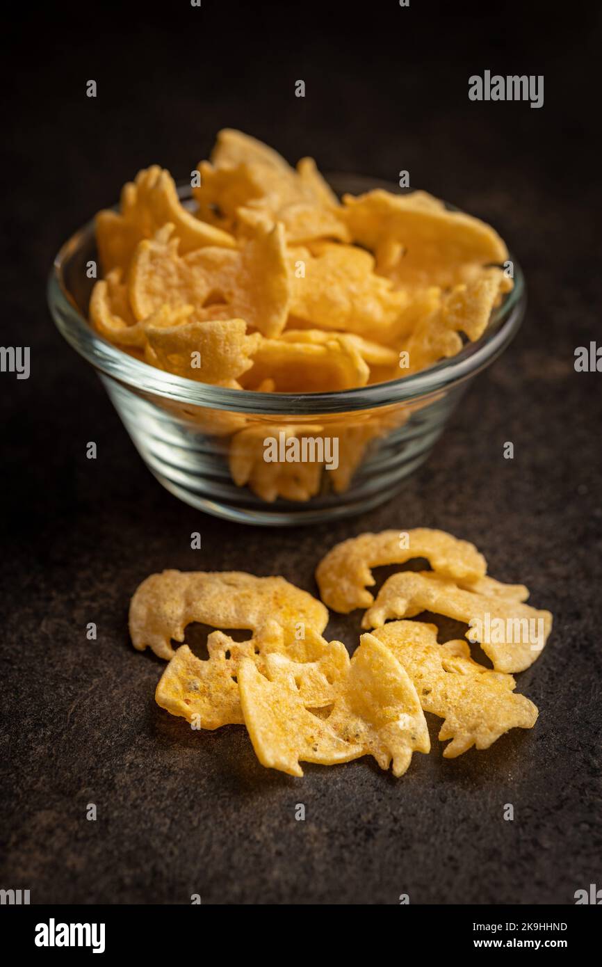 Halloween crispy bat shaped chips on the dark table Stock Photo - Alamy