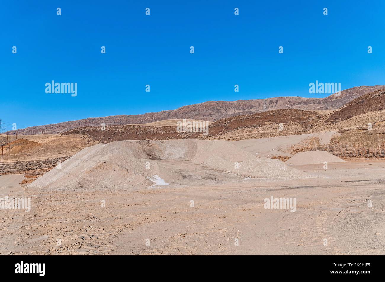 Tire and tread tracks are quite evident in the soil of an active solid ...