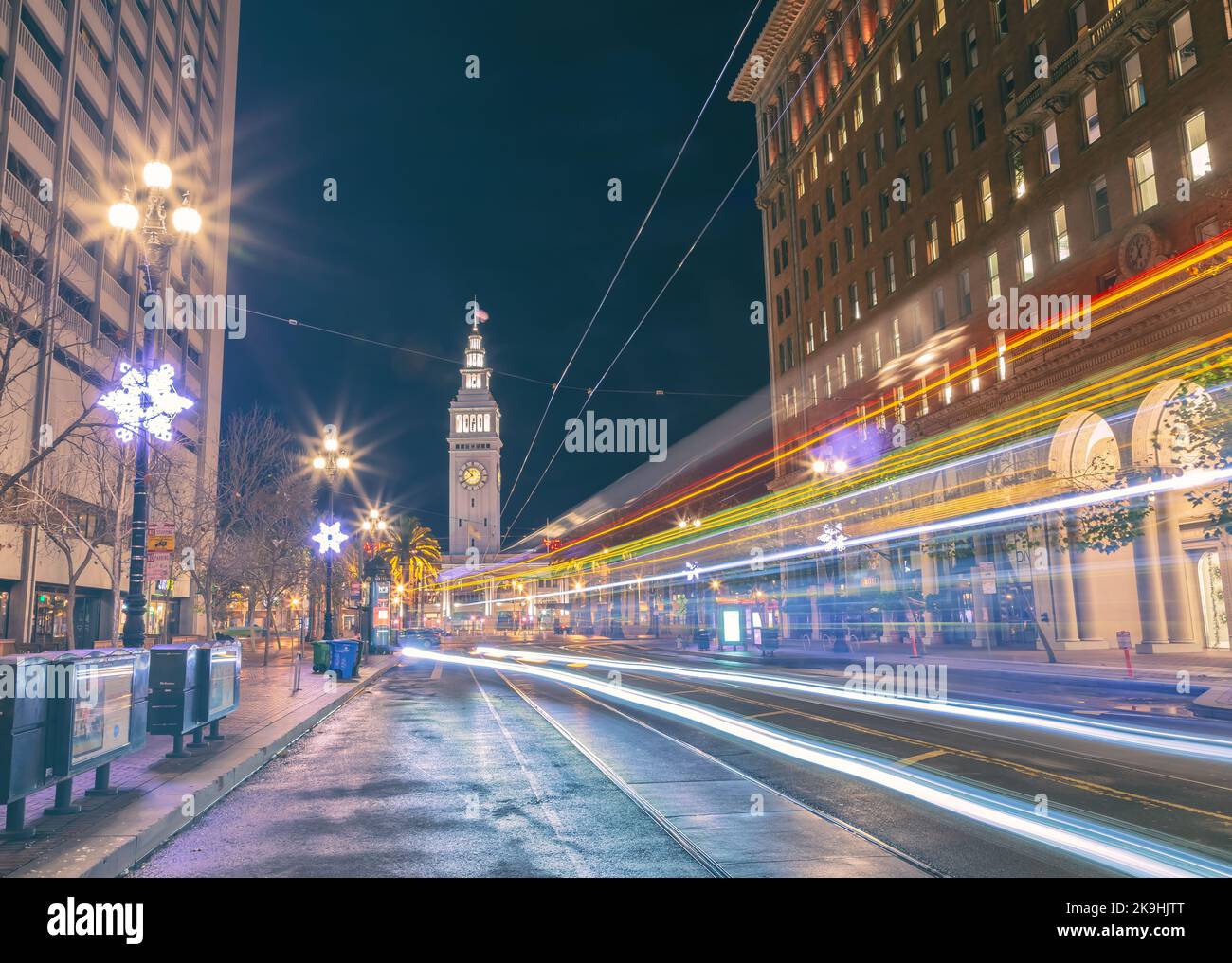 Clock Tower at the Ferry Building, and the traffic on the Market Street ...