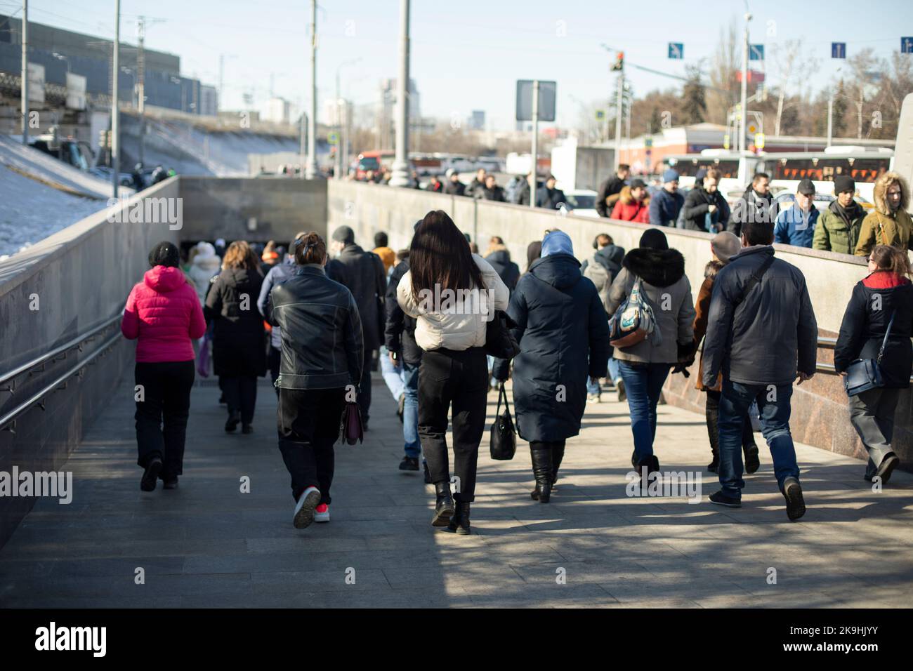 Lot of people walk around city. Men and women on street. Citizens are ...