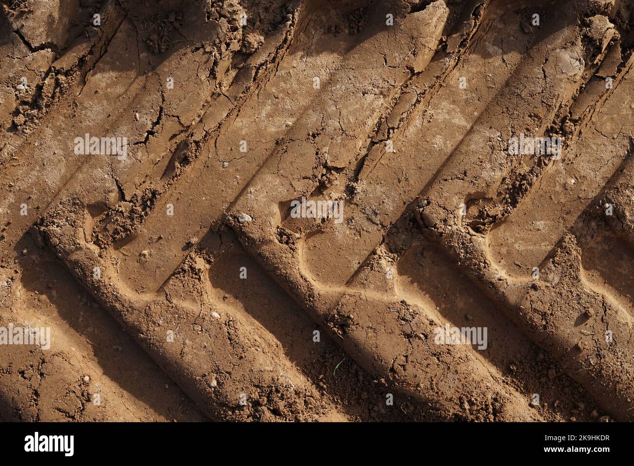 Wheel tracks on dirt soil Stock Photo - Alamy