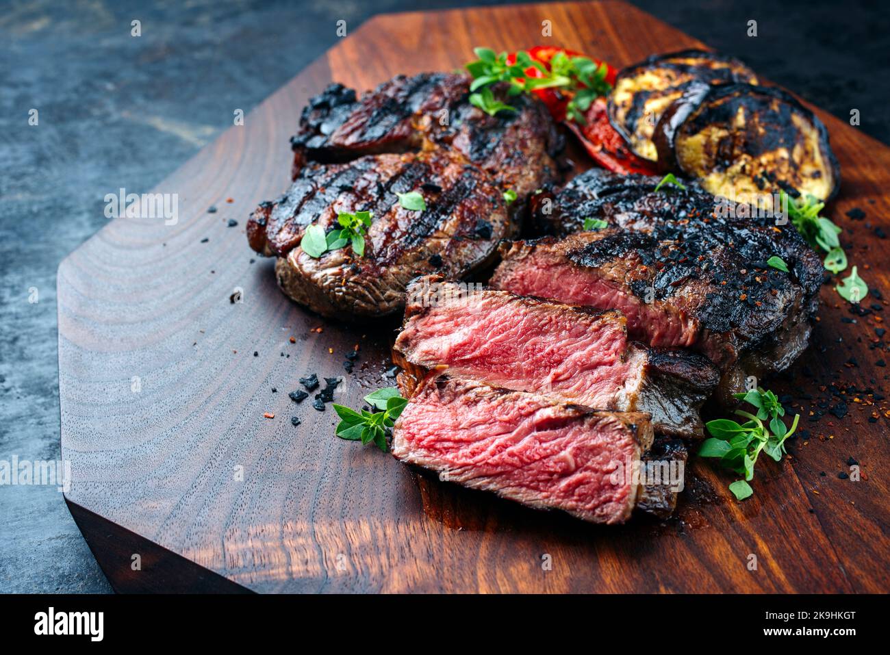 Barbecue dry aged angus rib-eye beef steak with grilled vegetable and ...